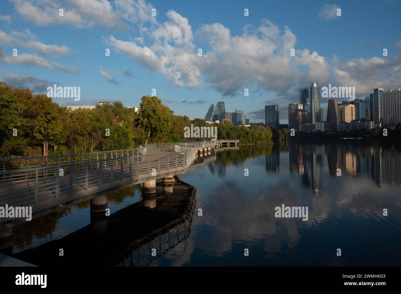 skyline of Austin with reflection in river in early morning, Texas ...