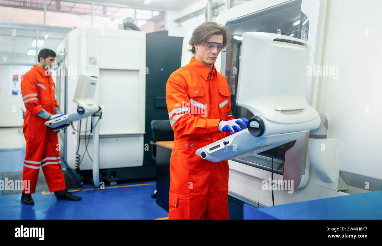 Mechanical engineer using coordinate measuring machine CMM measurement ...