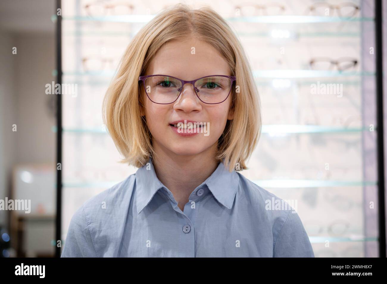 portrait happy little girl patient ophthalmology clinic, vision test in ...