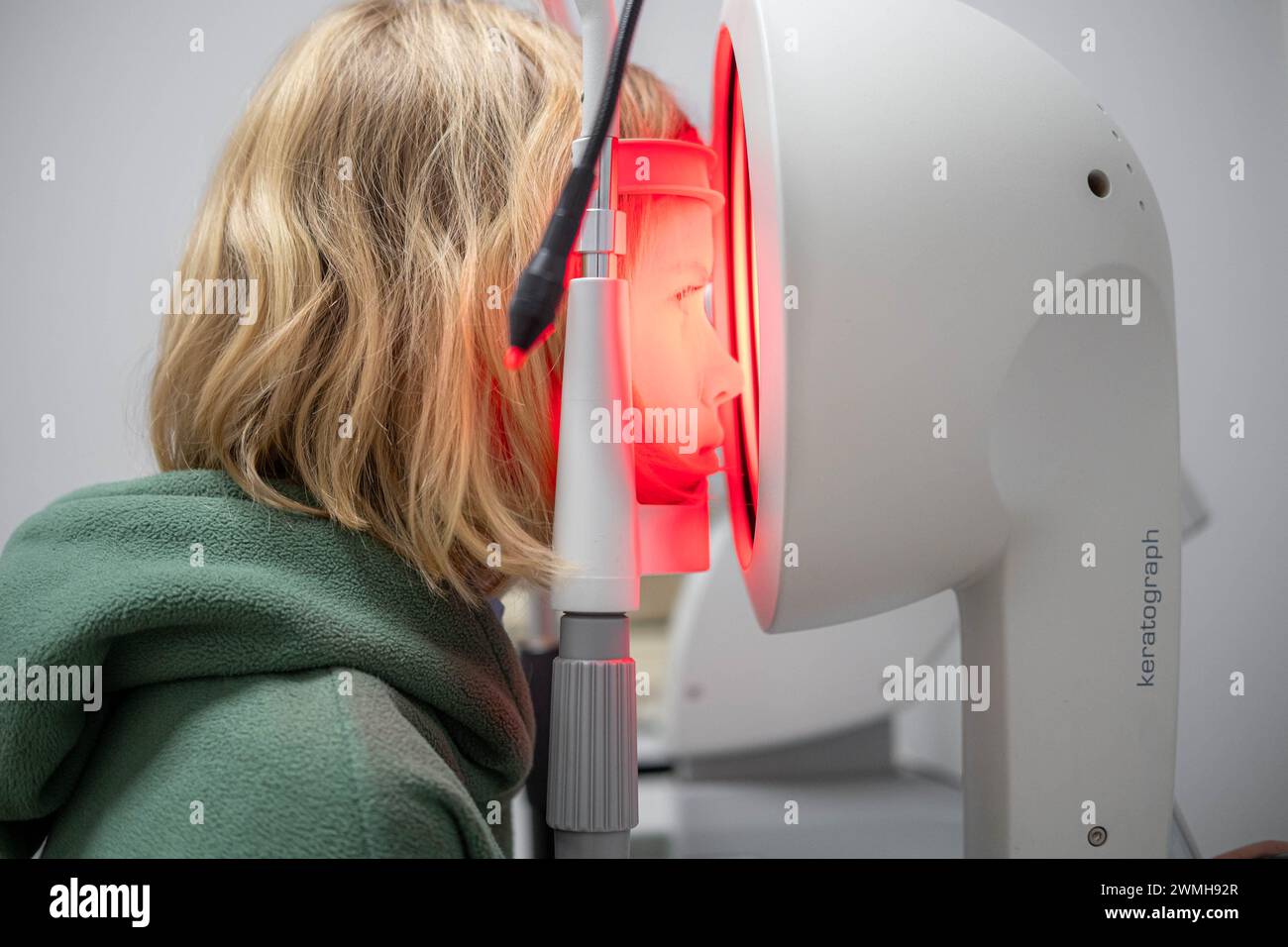 side view little girl patient ophthalmology clinic, vision test on ...