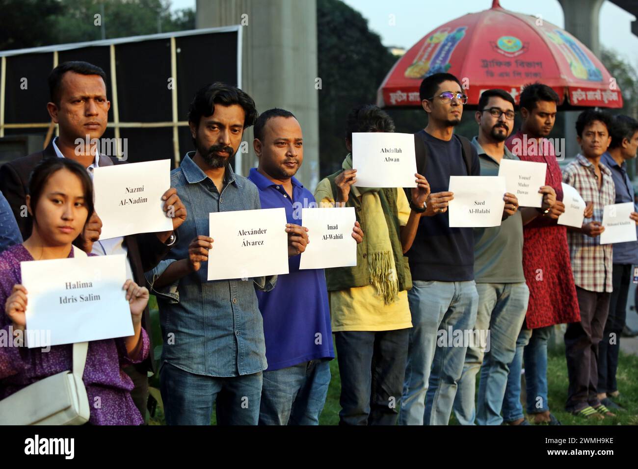Bangladesh journalists hold placards with names of dead journalists as ...