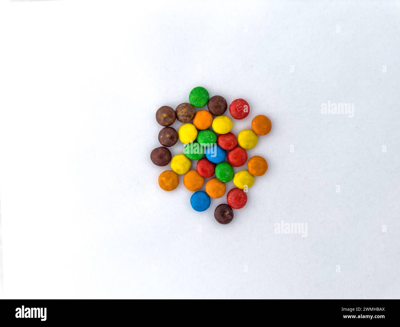 Multiple color button candies on a white isolated background Stock ...