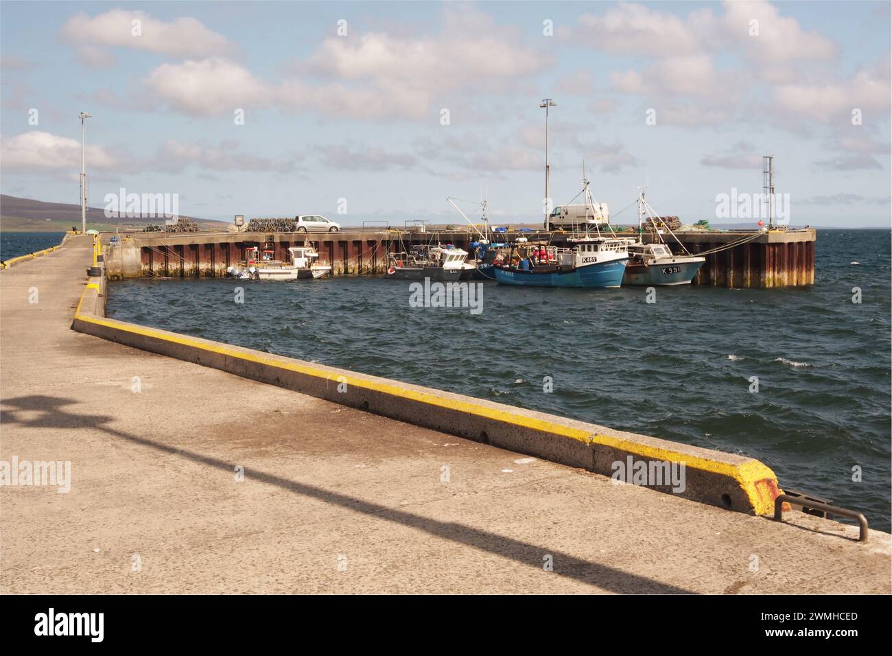 Fishing boats at Tingwall pier, Orkney, Scotland UK Stock Photo - Alamy