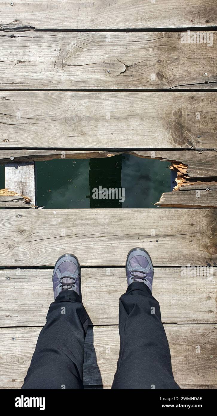 Man by broken bridge hi-res stock photography and images - Alamy