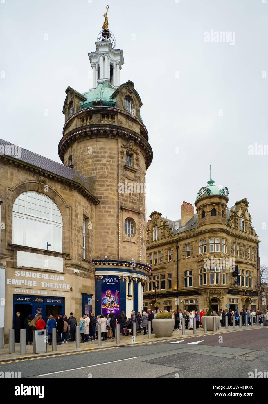 Queue for the panto outside the Empire Theatre in the centre of ...
