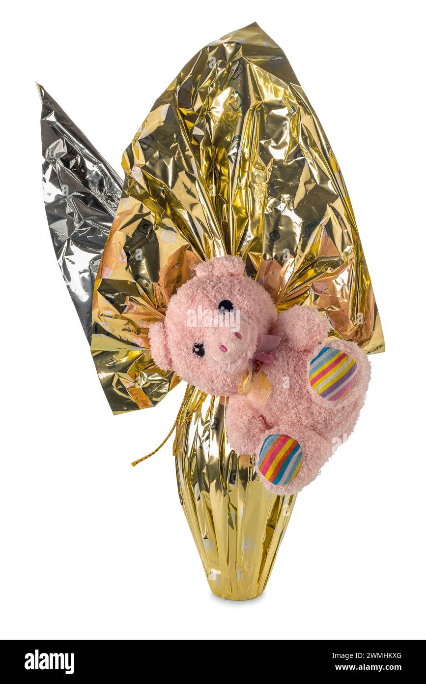 Chocolate easter egg wrapped in gold foil with pink teddy bear isolated ...