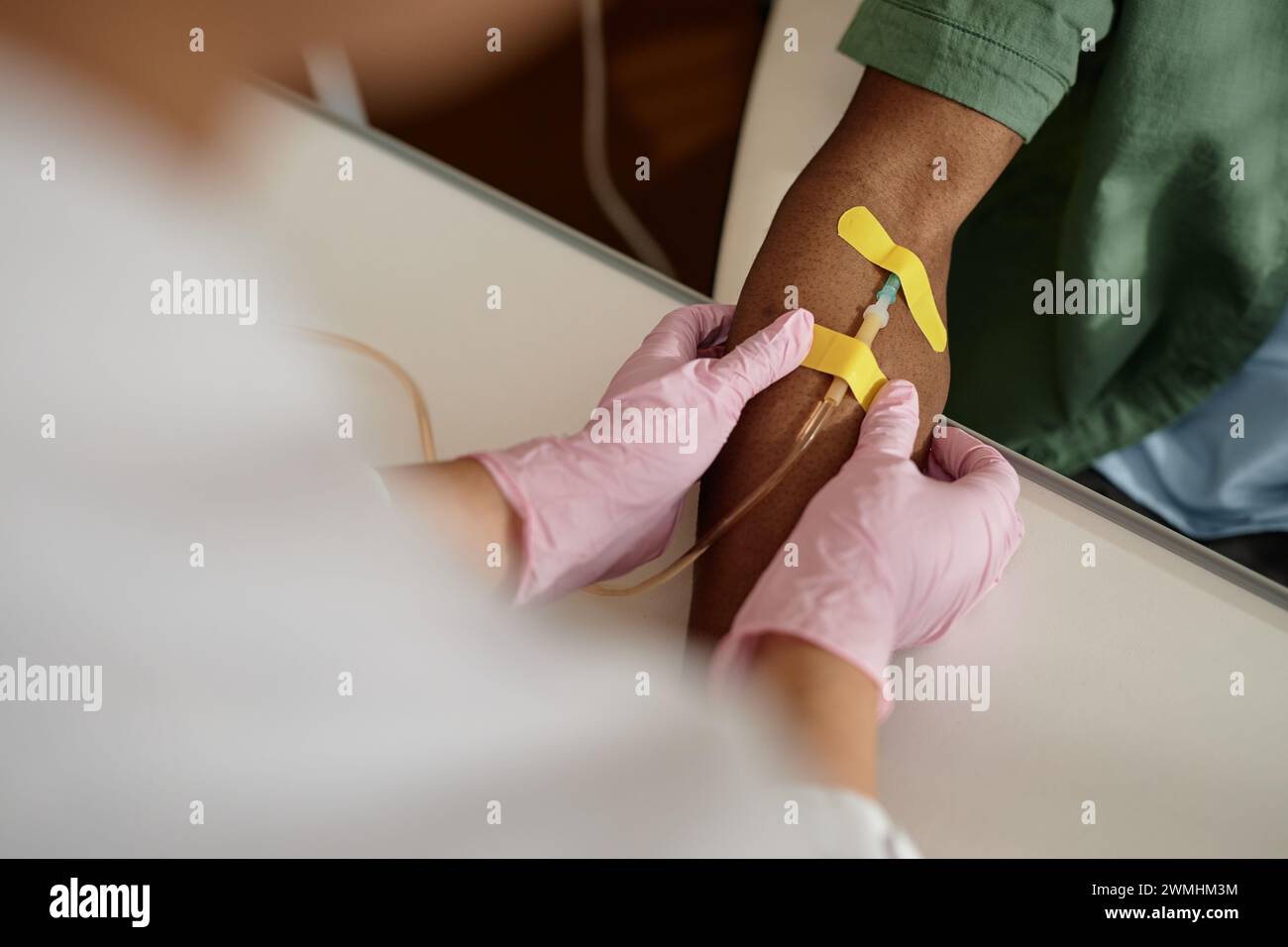 Doctor preparing iv patient hi-res stock photography and images - Alamy