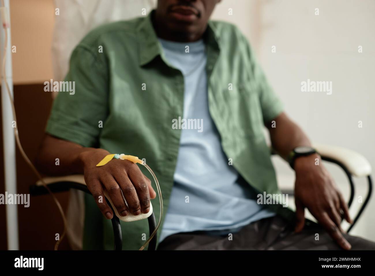 Close up of unrecognizable African American man receiving treatment in ...