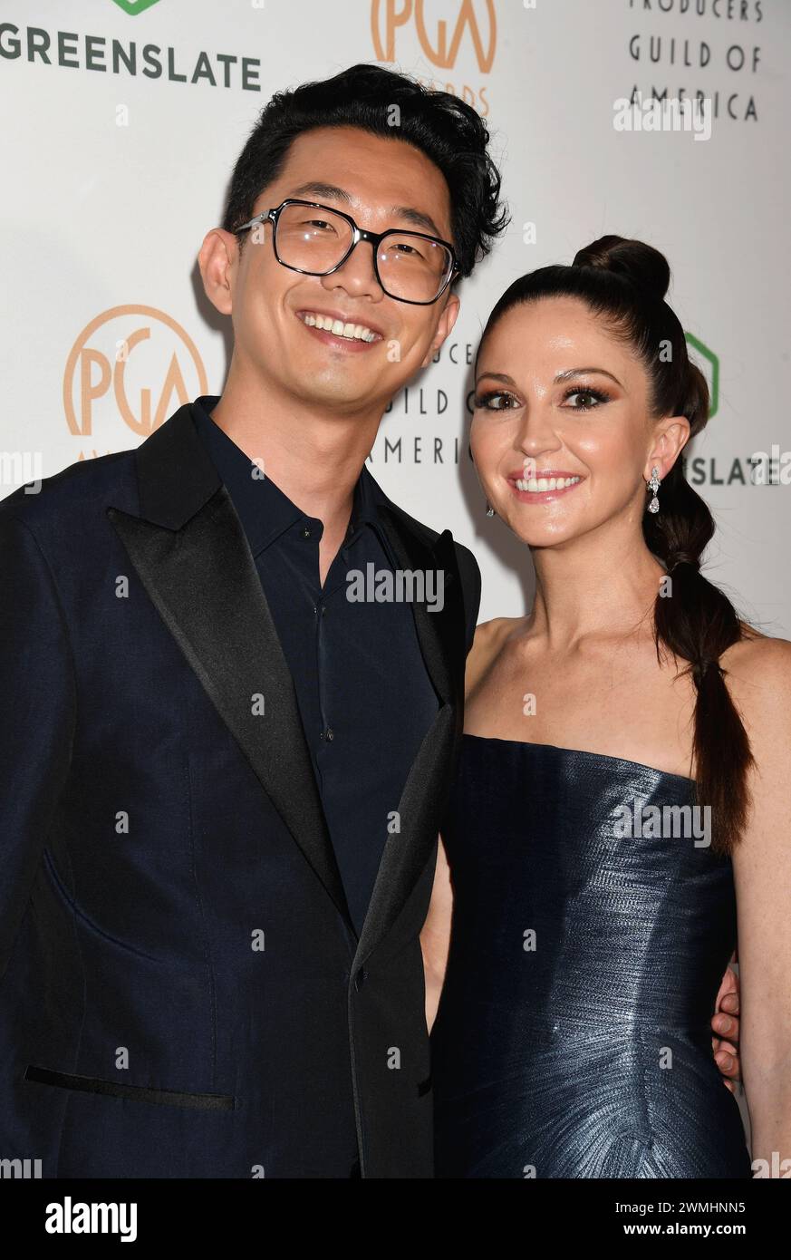 HOLLYWOOD, CALIFORNIA - FEBRUARY 25: (L-R) Lee Sung Jin and Caitlin Solone Lee attend the 35th ...