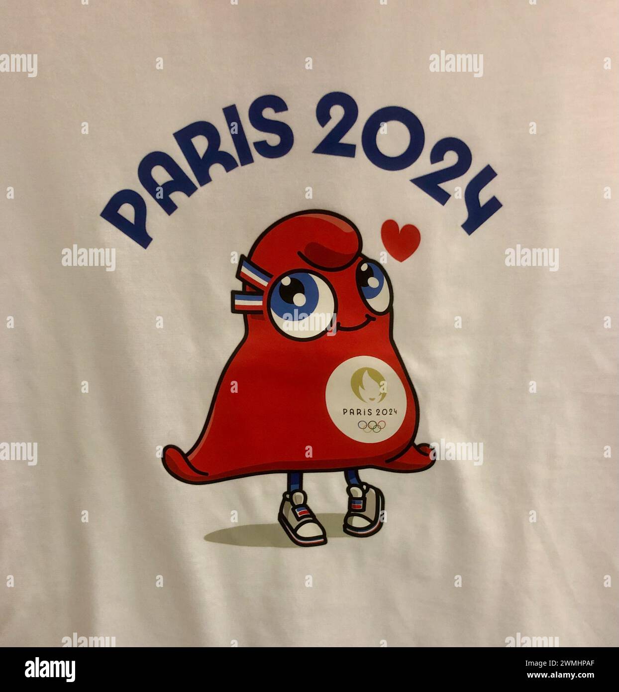 A childs T-Shirt featuring one of the little mascots called the Phryges ...