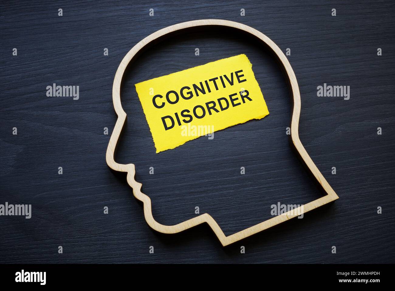 Cognitive disorder. Wooden outline of head and marking Stock Photo - Alamy