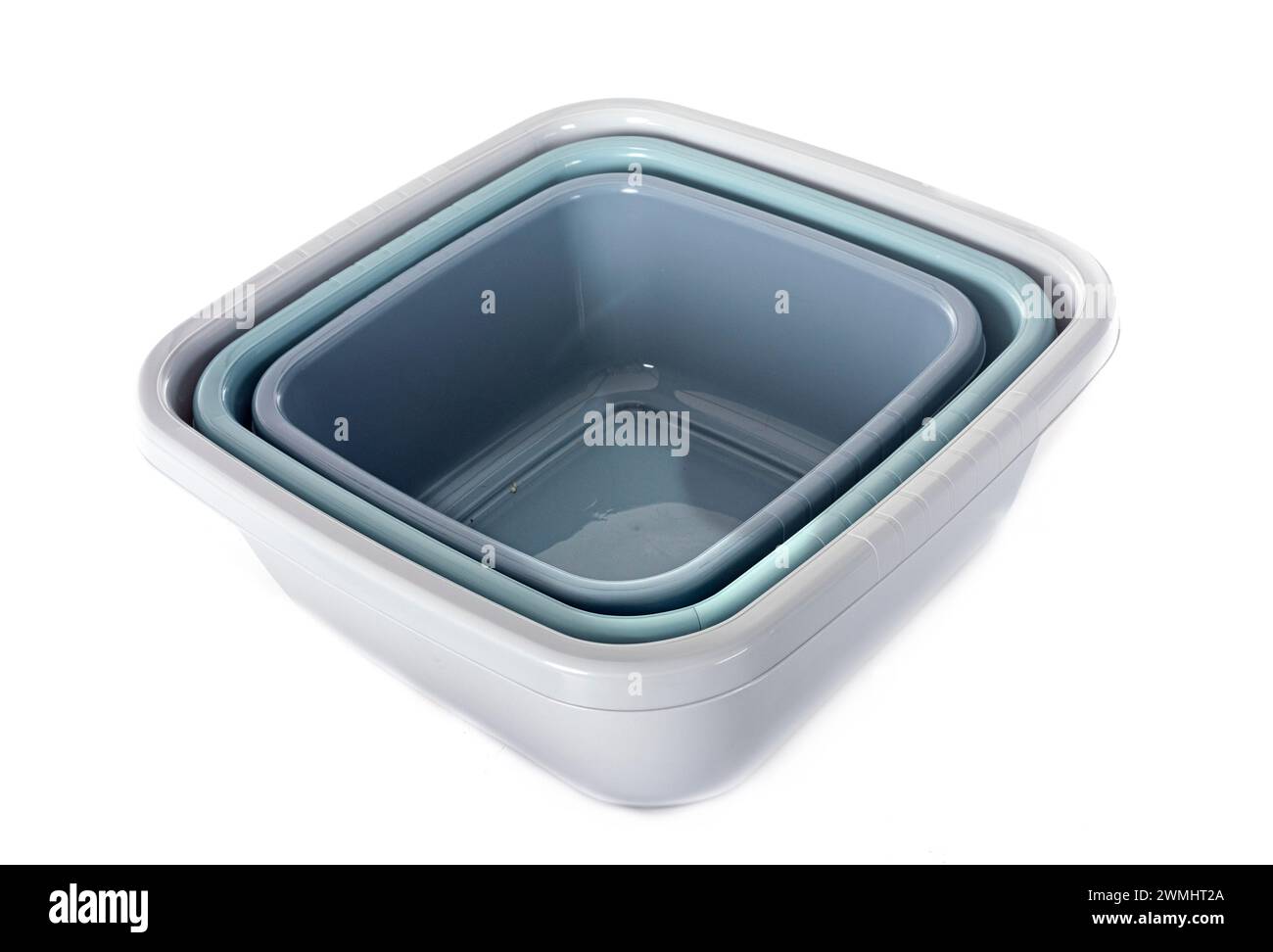 plastic basins in front of white background Stock Photo - Alamy