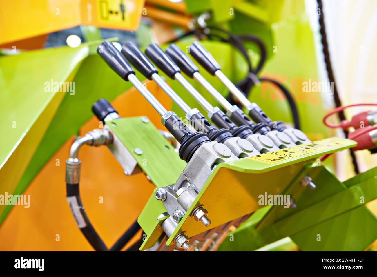Hydraulic control levers industrial device Stock Photo - Alamy
