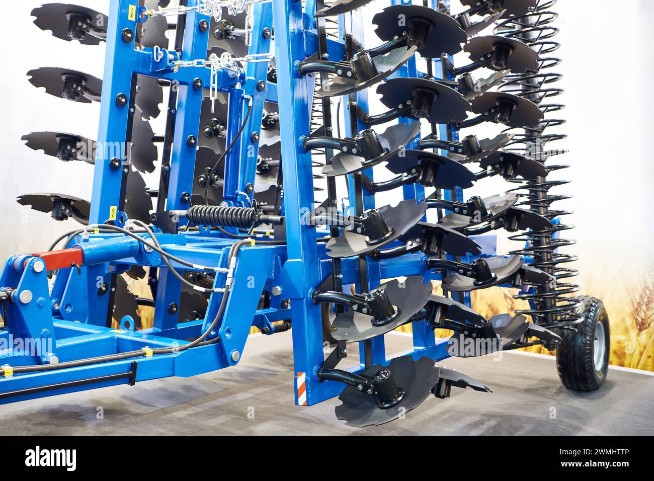 Disc harrow folded at an exhibition of agricultural machinery Stock ...