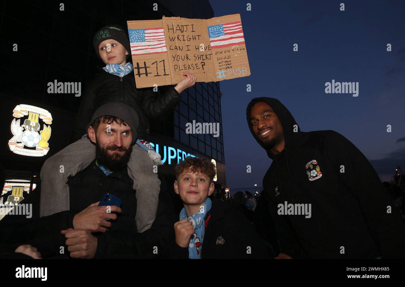 Coventry City's Haji Wright poses with fans as the team arrives before ...