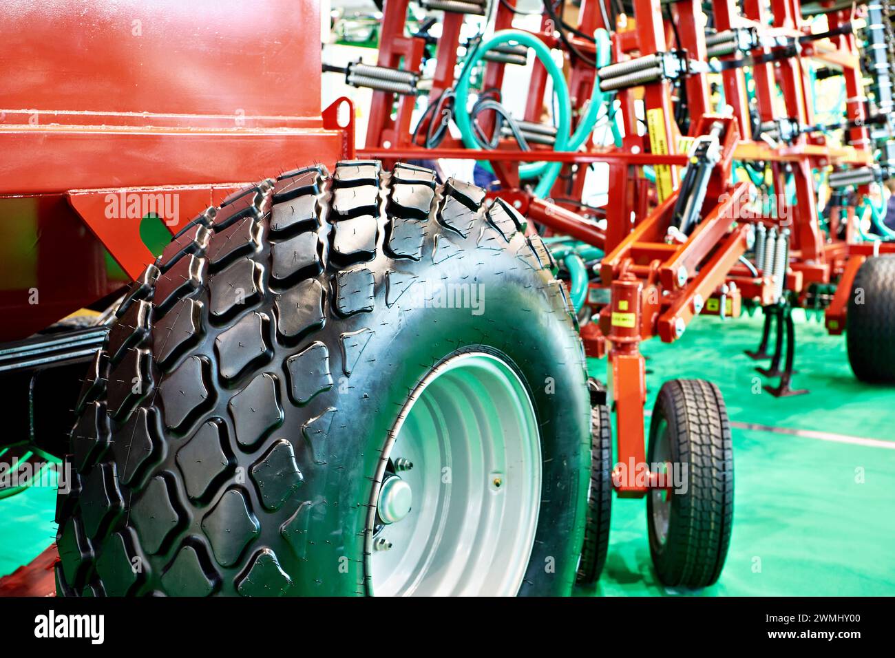 Agricultural transport tractor wheel on exhibition Stock Photo - Alamy
