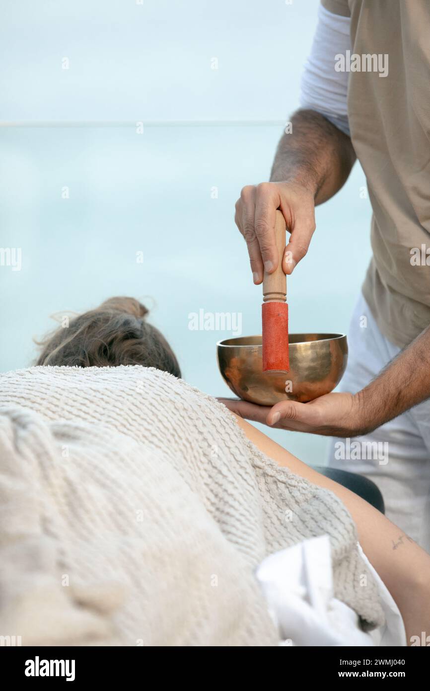 Holistic Wellness: Tibetan Singing Bowl Therapy Session by a Male ...