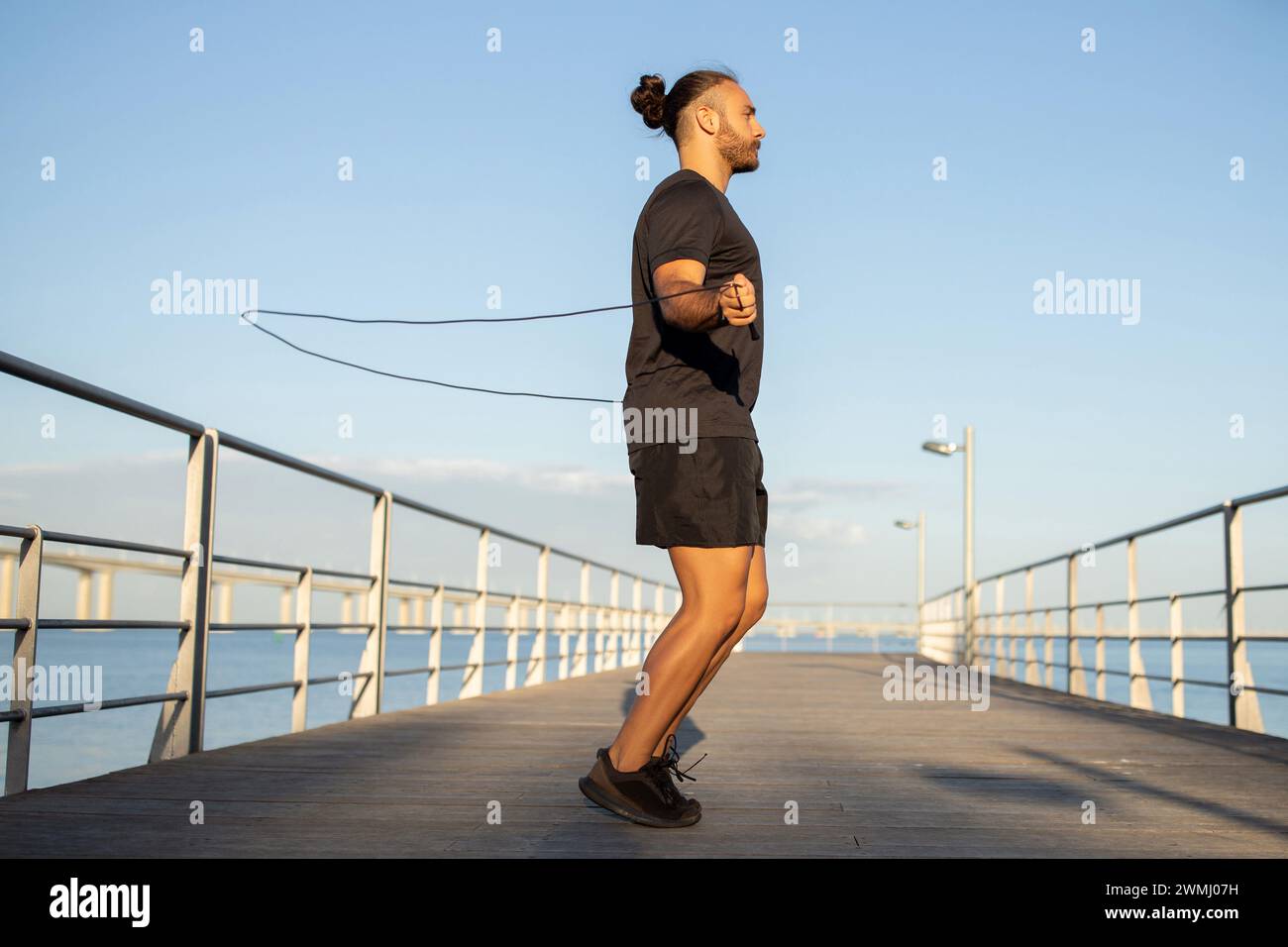 Man jumping rope and beach hi-res stock photography and images - Alamy