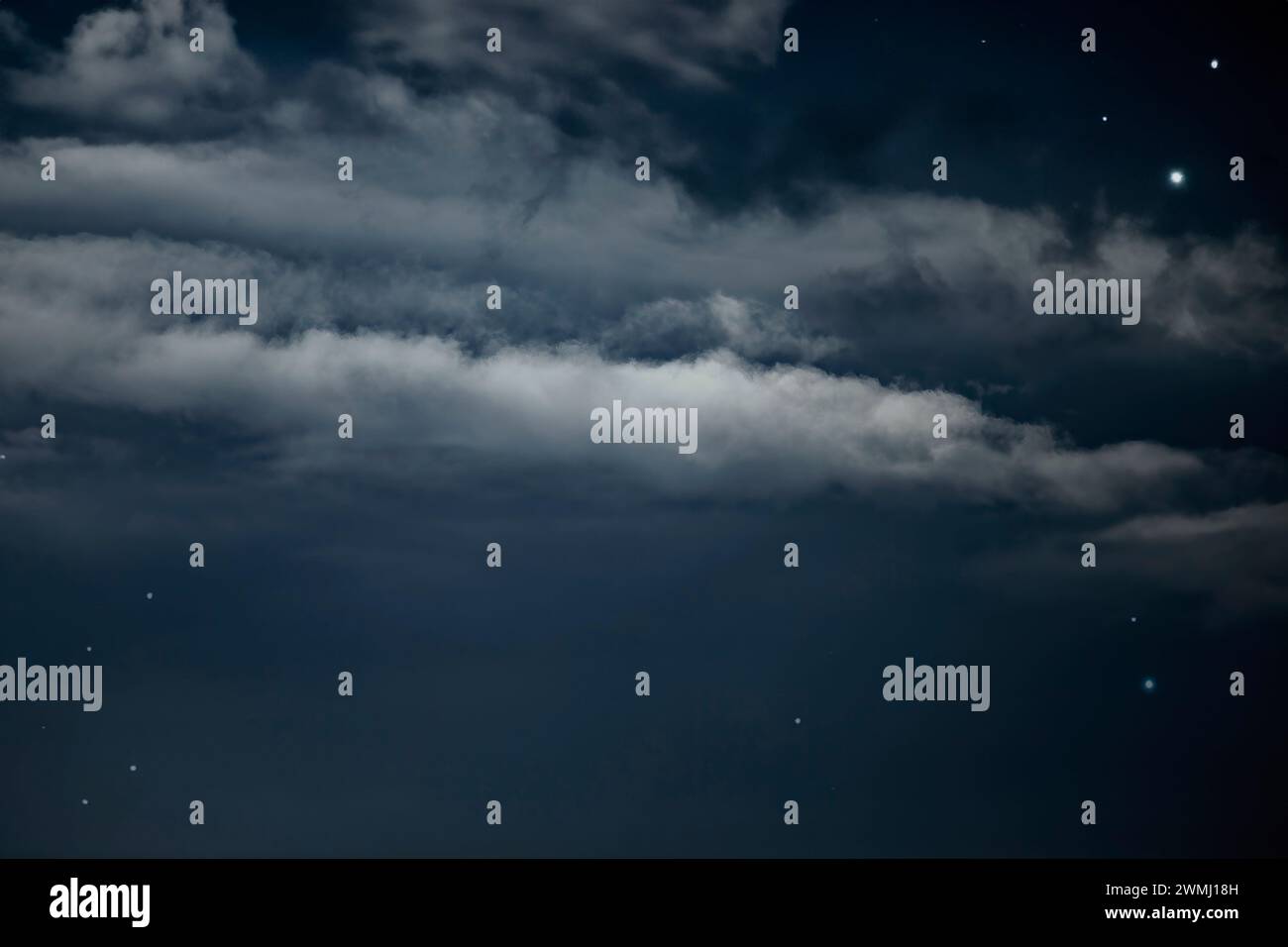 Night cloudy sky with stars Stock Photo - Alamy