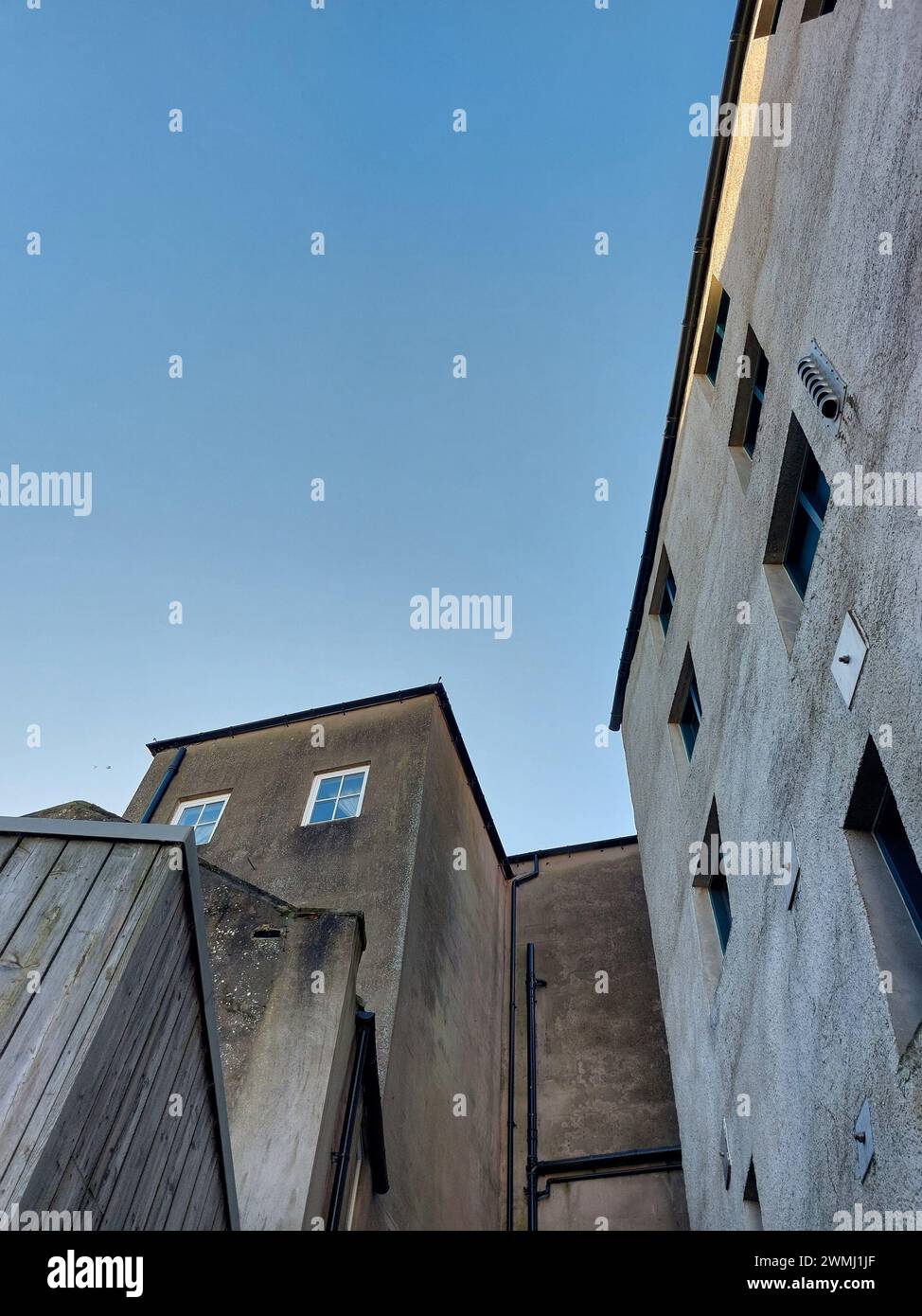 A street scene with old stone buildings Stock Photo - Alamy