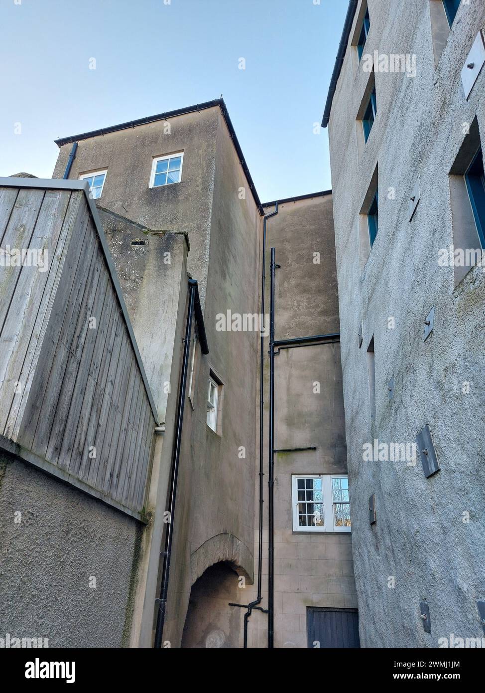 A street scene with old stone buildings Stock Photo - Alamy