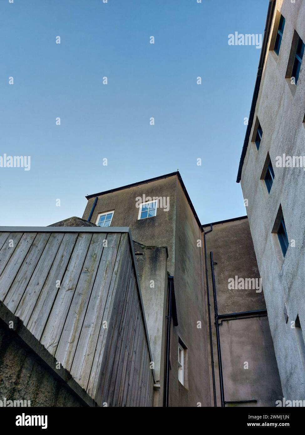 A street scene with old stone buildings Stock Photo - Alamy