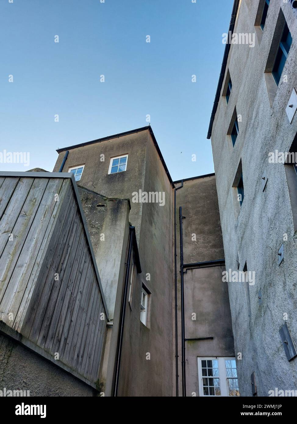 A street scene with old stone buildings Stock Photo - Alamy