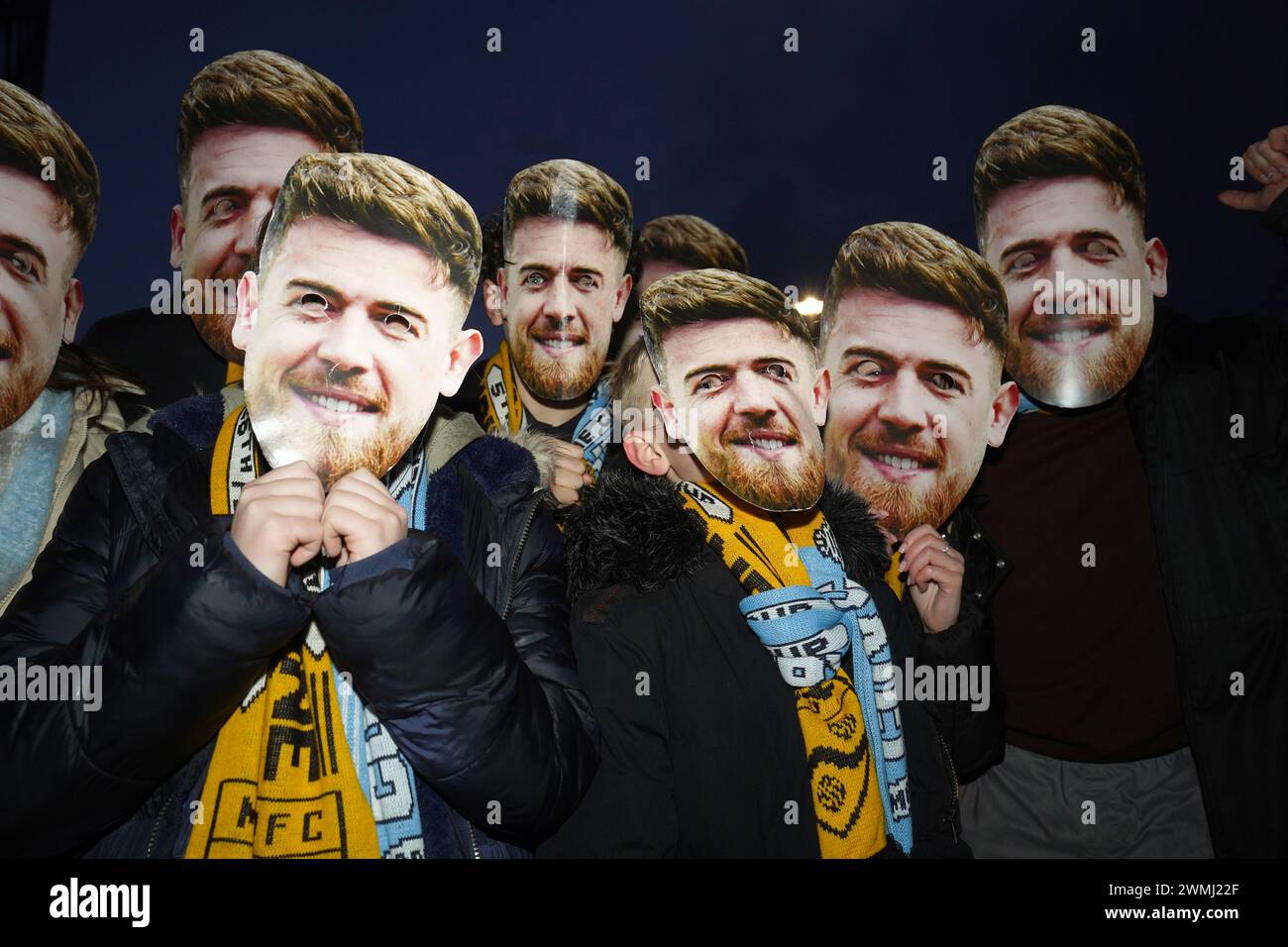Maidstone United fans wearing masks of player Sam Bone before the ...