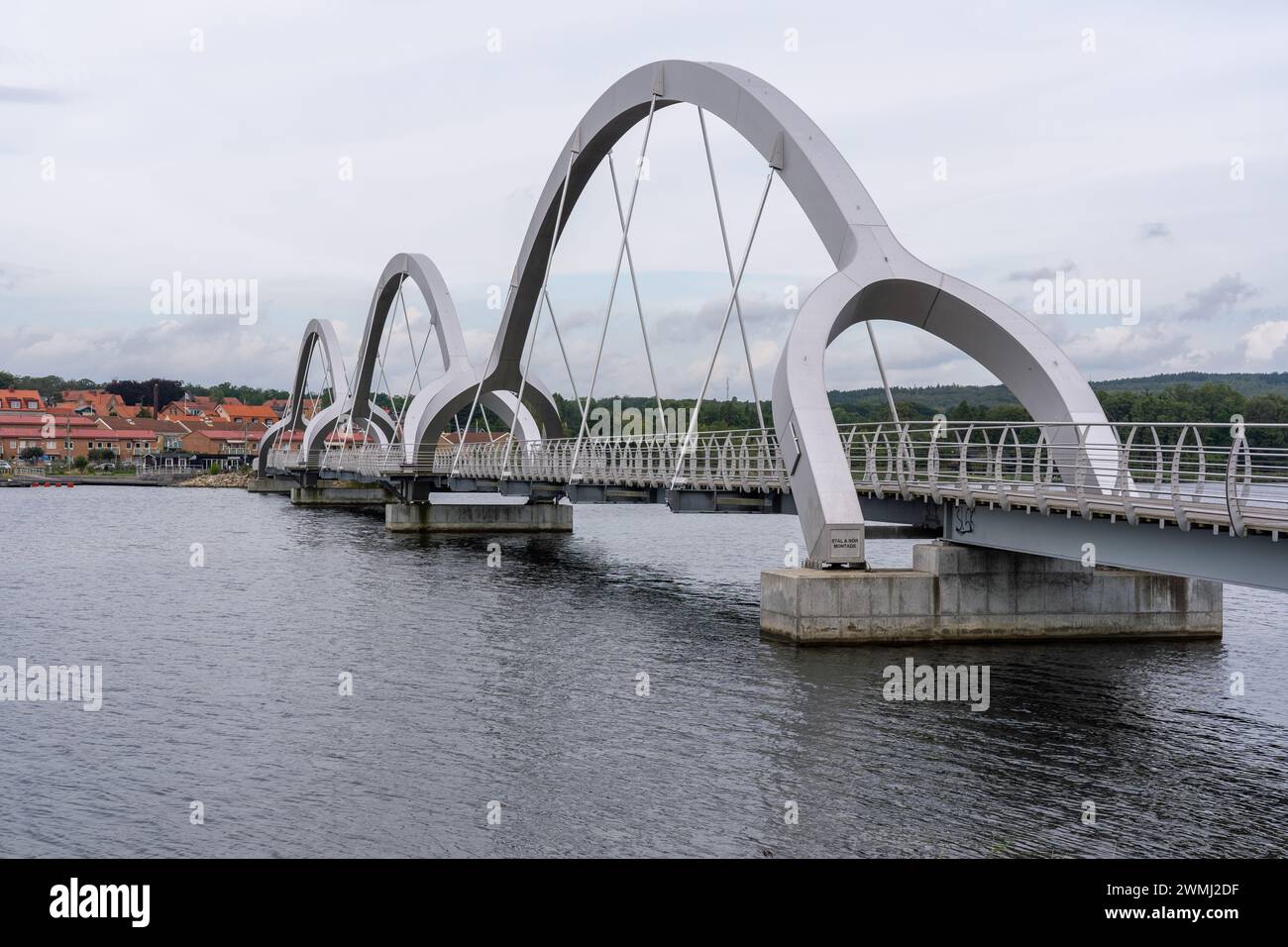 A bridge with two suspended gates opening over water, Sweden ...