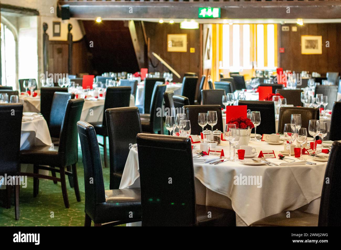 Event room with tables laid out Stock Photo - Alamy