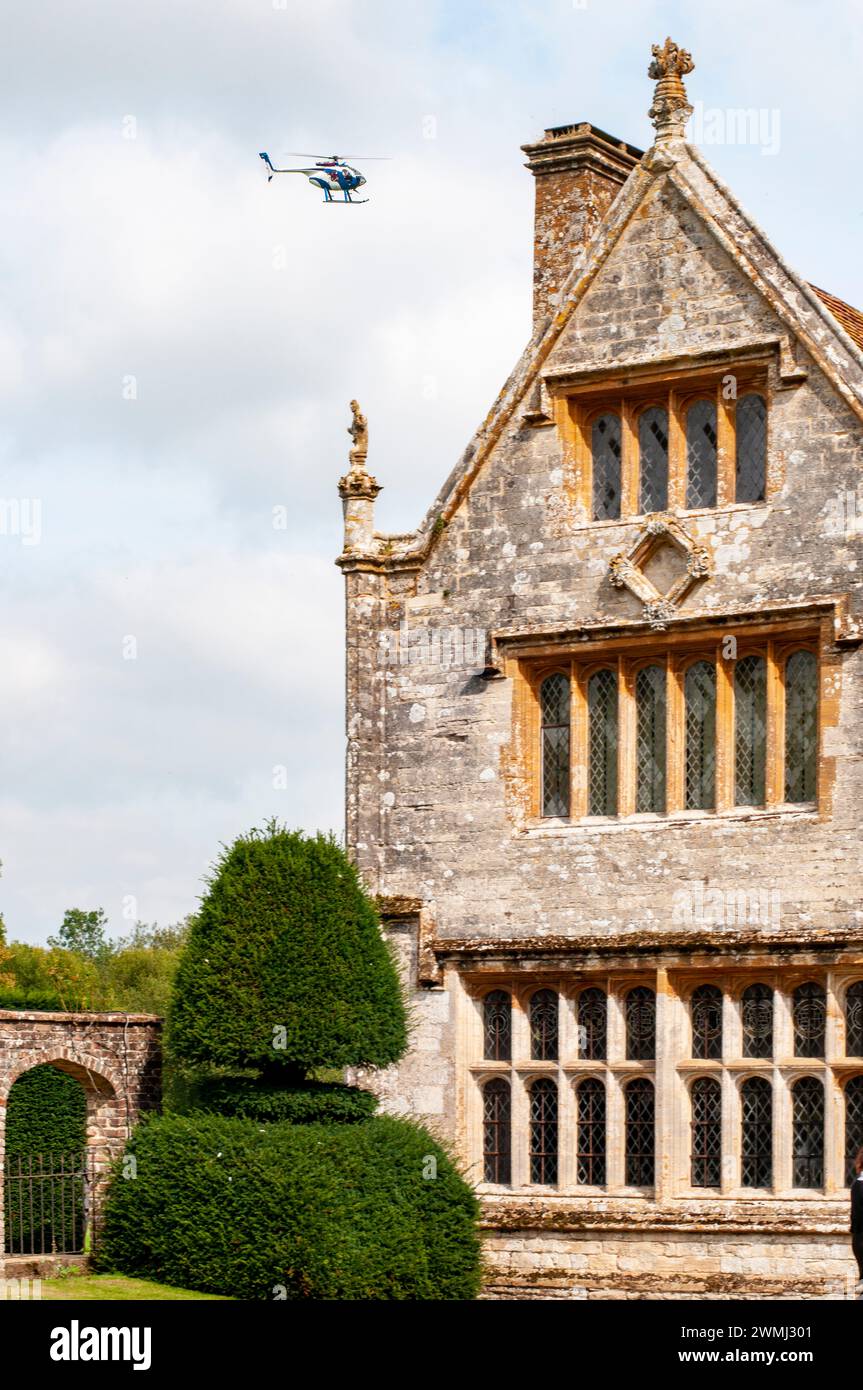 Helicopter over Country House Stock Photo - Alamy