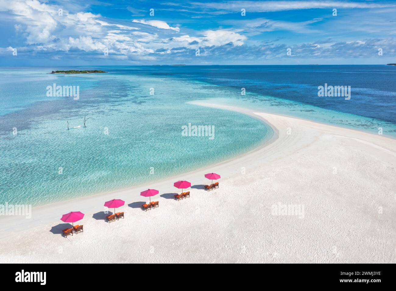 White sand with loungers, sun beds and umbrella travel tourism leisure ...