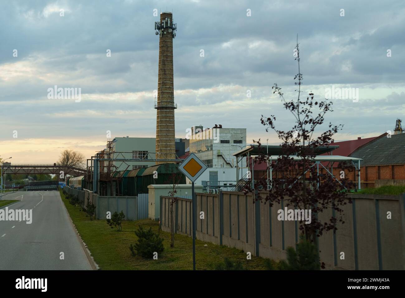 A city street lined with buildings on either side, leading towards a ...