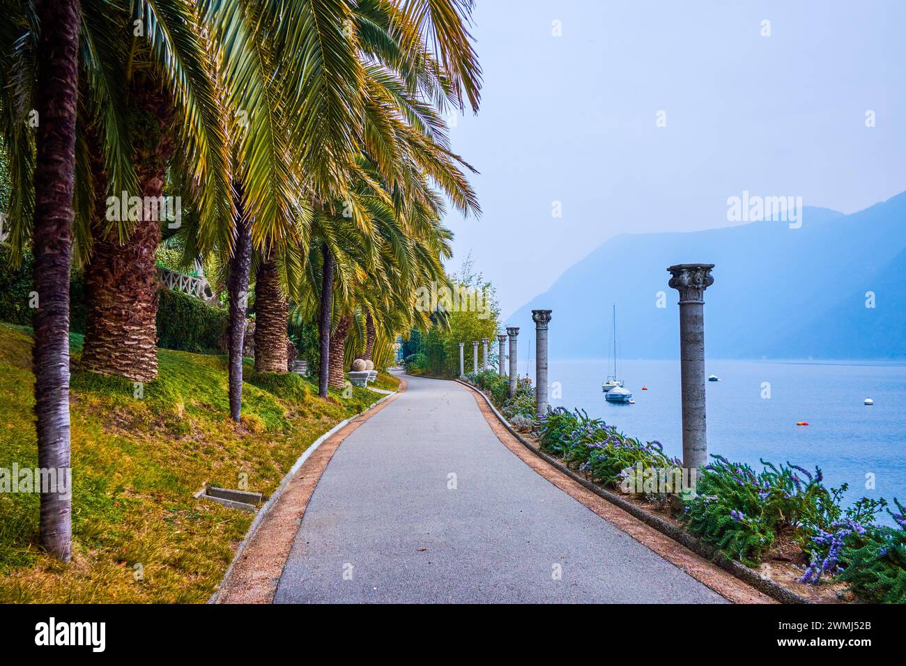The lakeside path in Park Villa Heleneum on Lake Lugano, Lugano ...