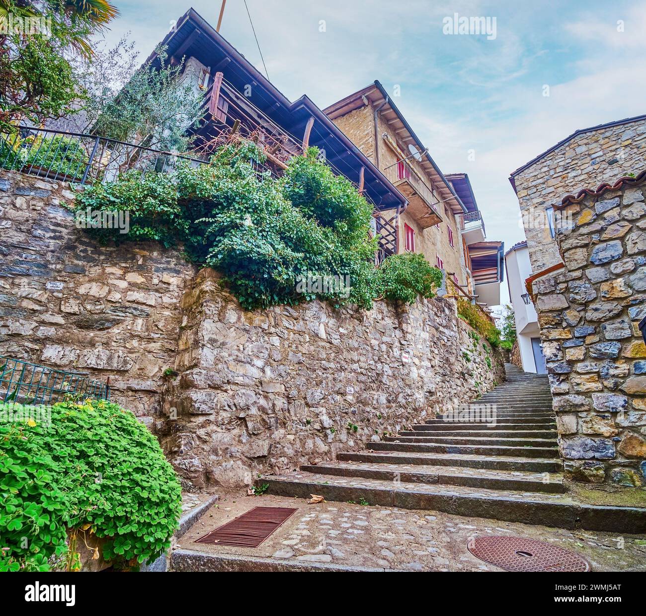 Old stone medieval staircases leading to the upper level of hilly ...