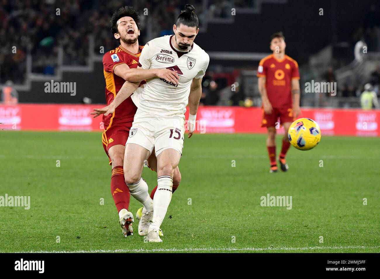 Sardar Azmoun of AS Roma and Saba Sazonov of Torino Calcio compete for ...