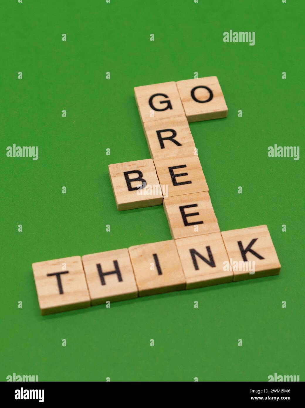 wood letters spelling go green, be green, think green Stock Photo - Alamy