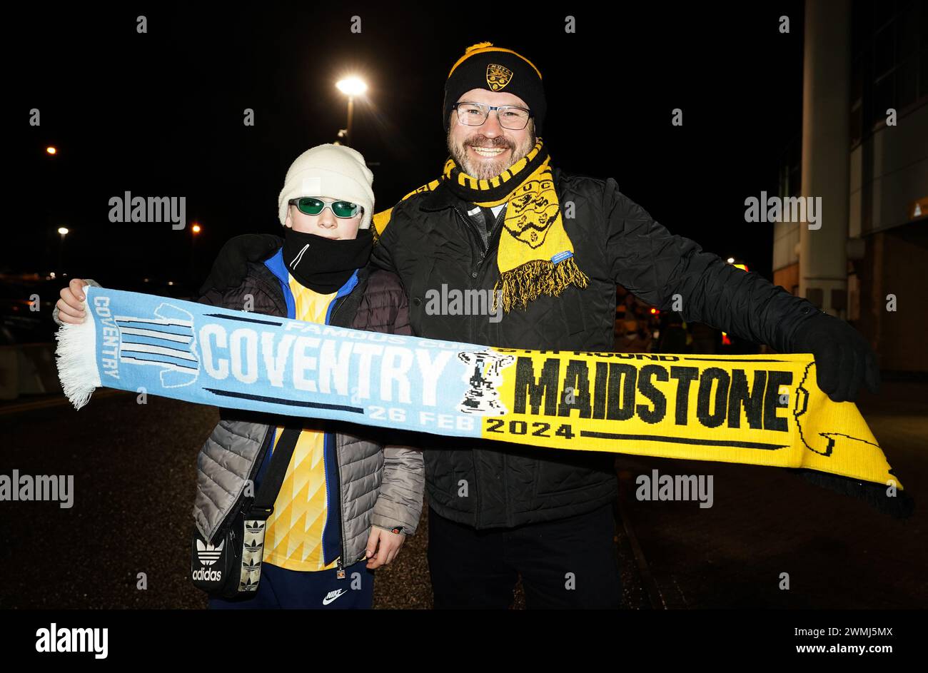 Maidstone United fans Simon Craig and Ethan Craig outside the ground ...