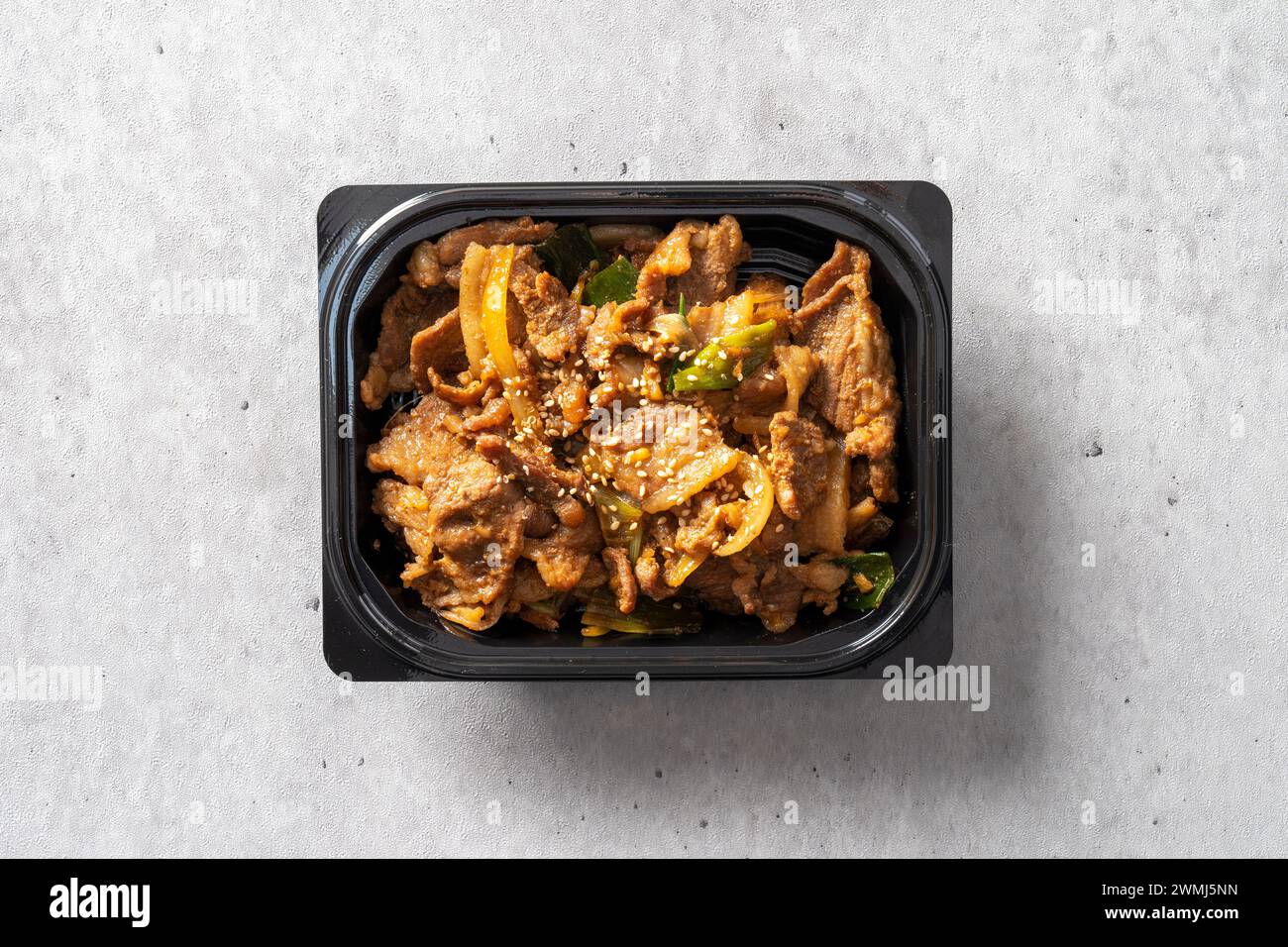 Soy sauce bulgogi, red pepper paste bulgogi over rice Korean food dish ...