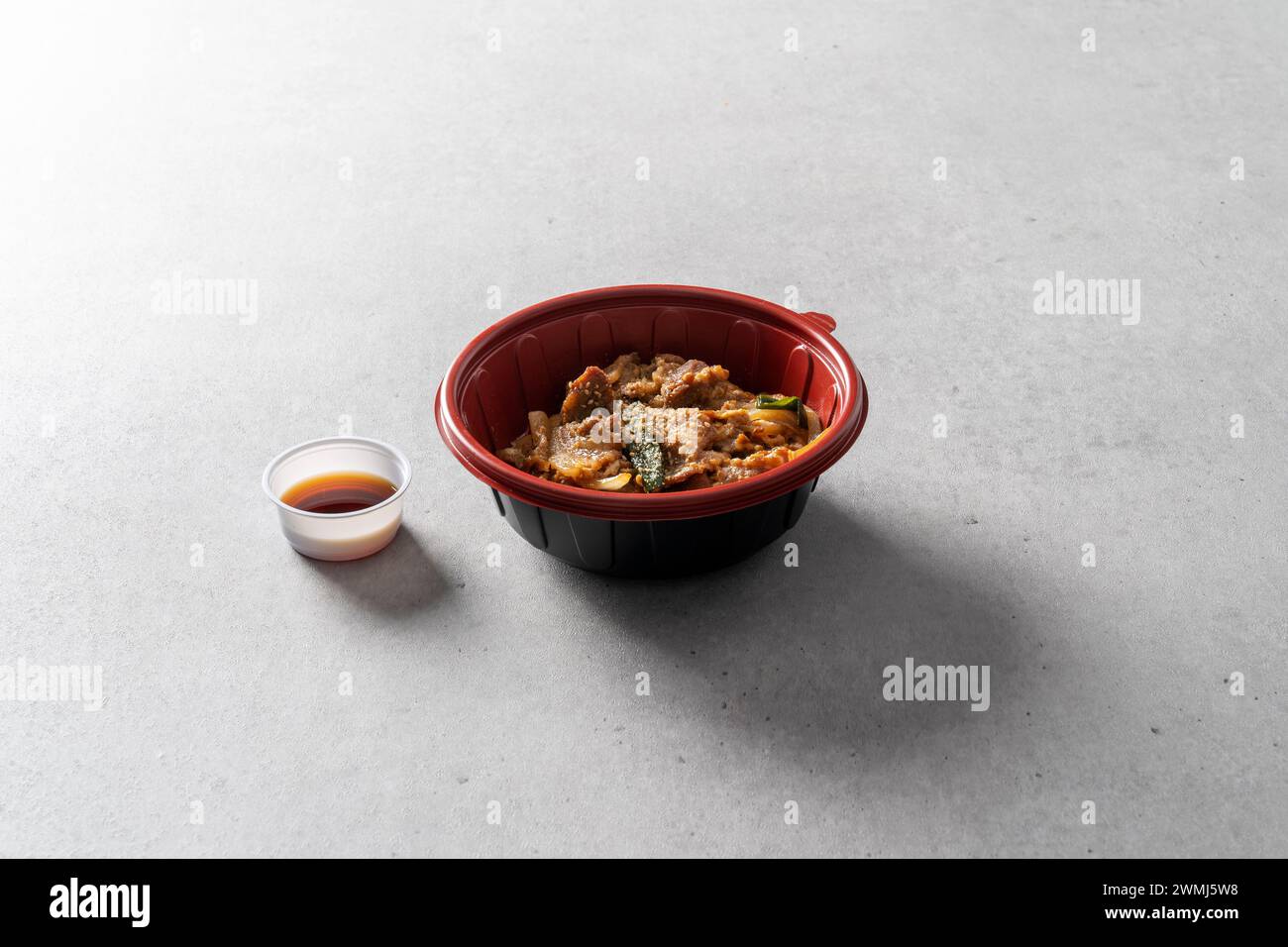 Soy sauce bulgogi, red pepper paste bulgogi over rice Korean food dish ...