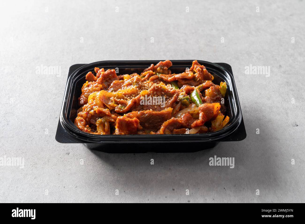 Soy sauce bulgogi, red pepper paste bulgogi over rice Korean food dish ...