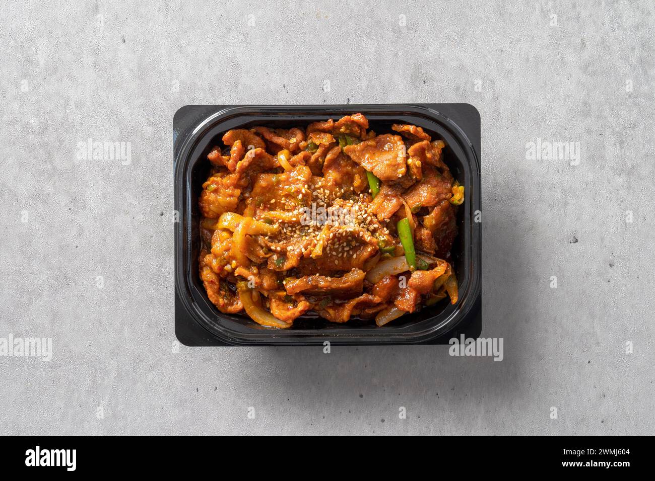 Soy sauce bulgogi, red pepper paste bulgogi over rice Korean food dish ...