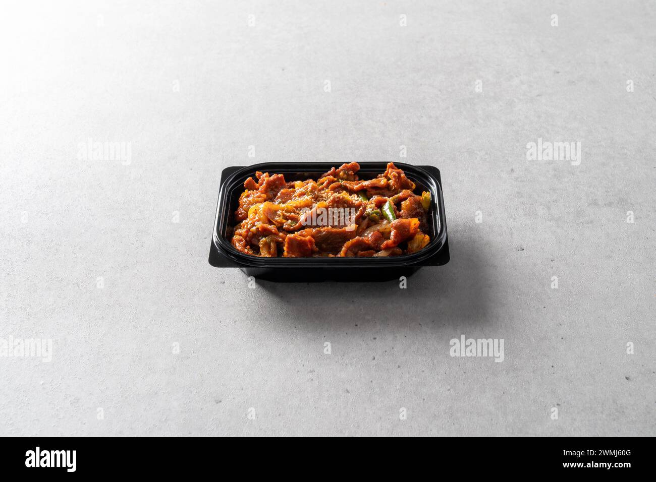 Soy sauce bulgogi, red pepper paste bulgogi over rice Korean food dish ...