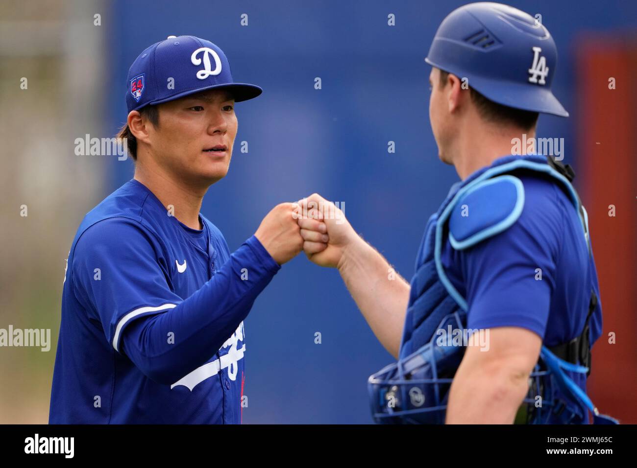Los Angeles Dodgers pitcher Yoshinobu Yamamoto greets catcher Will ...