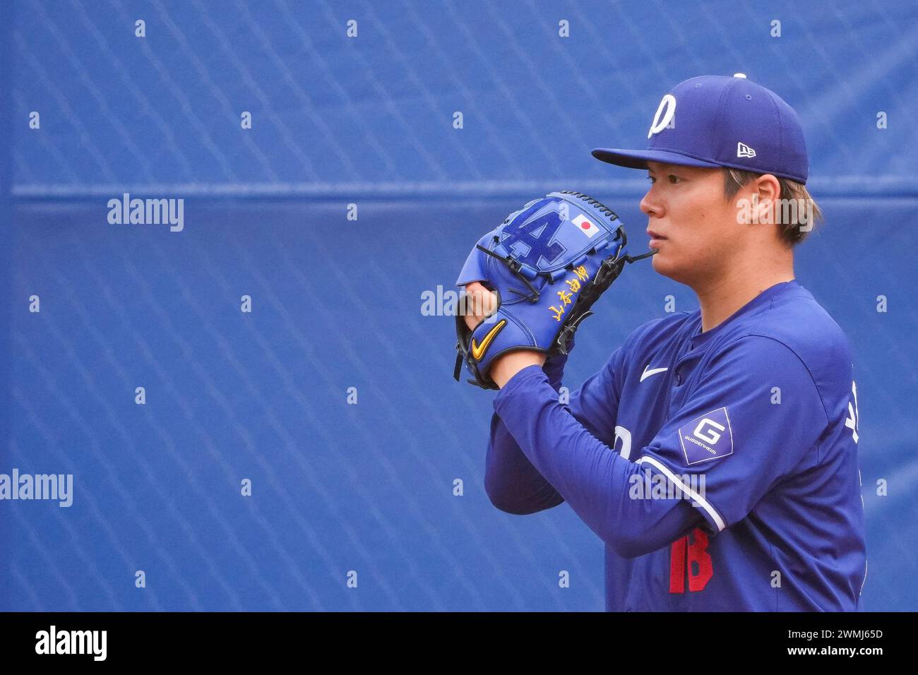 Los Angeles Dodgers pitcher Yoshinobu Yamamoto throws a bullpen session ...