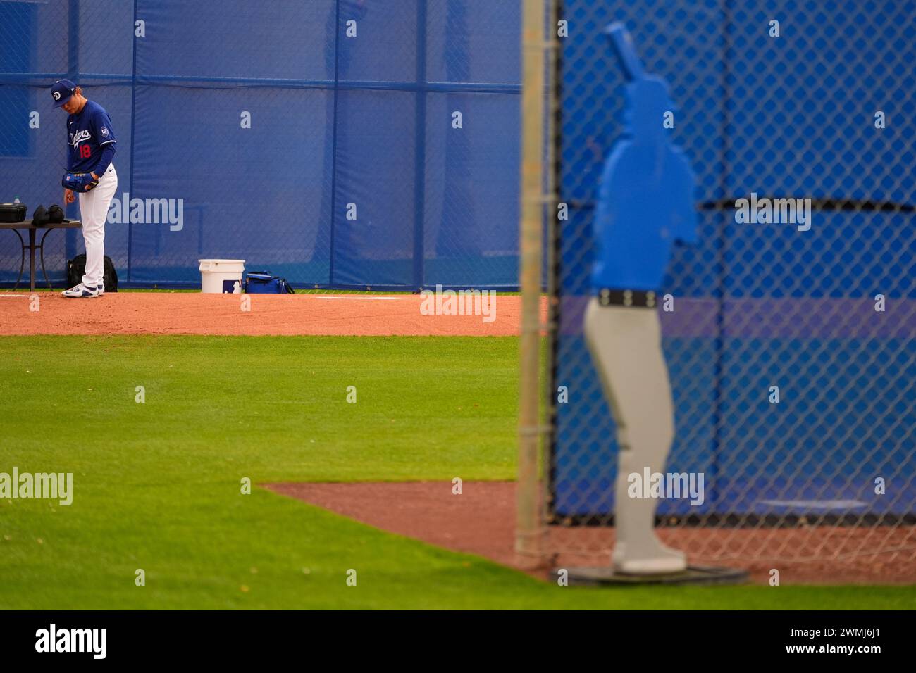 Los Angeles Dodgers pitcher Yoshinobu Yamamoto stands in the bullpen ...