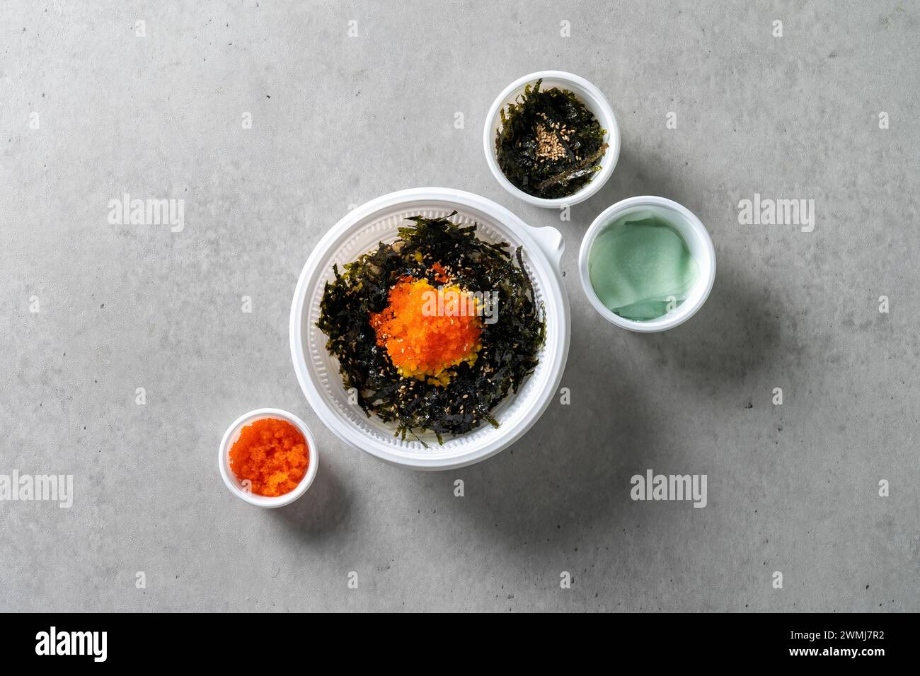 Beef gopchang gopdoritang, flying fish roe rice balls, and gopchang ...