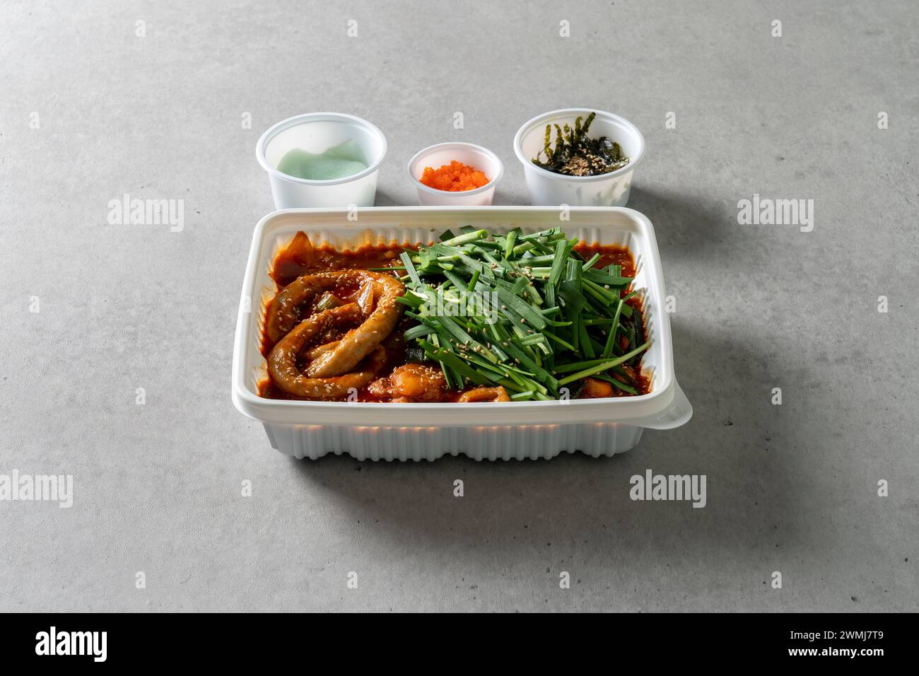 Beef gopchang gopdoritang, flying fish roe rice balls, and gopchang ...