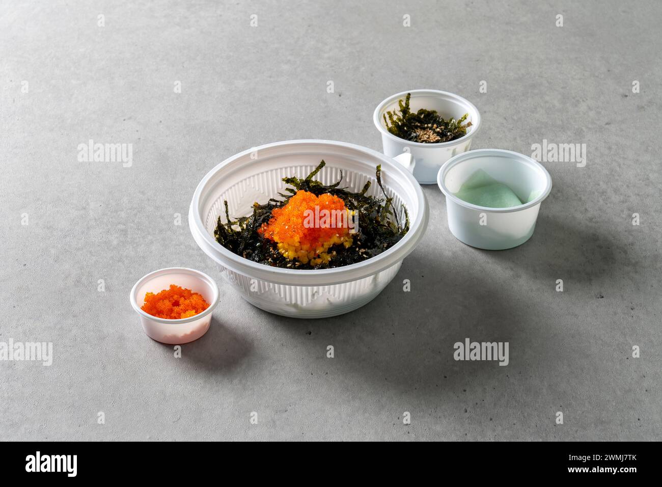 Beef gopchang gopdoritang, flying fish roe rice balls, and gopchang ...