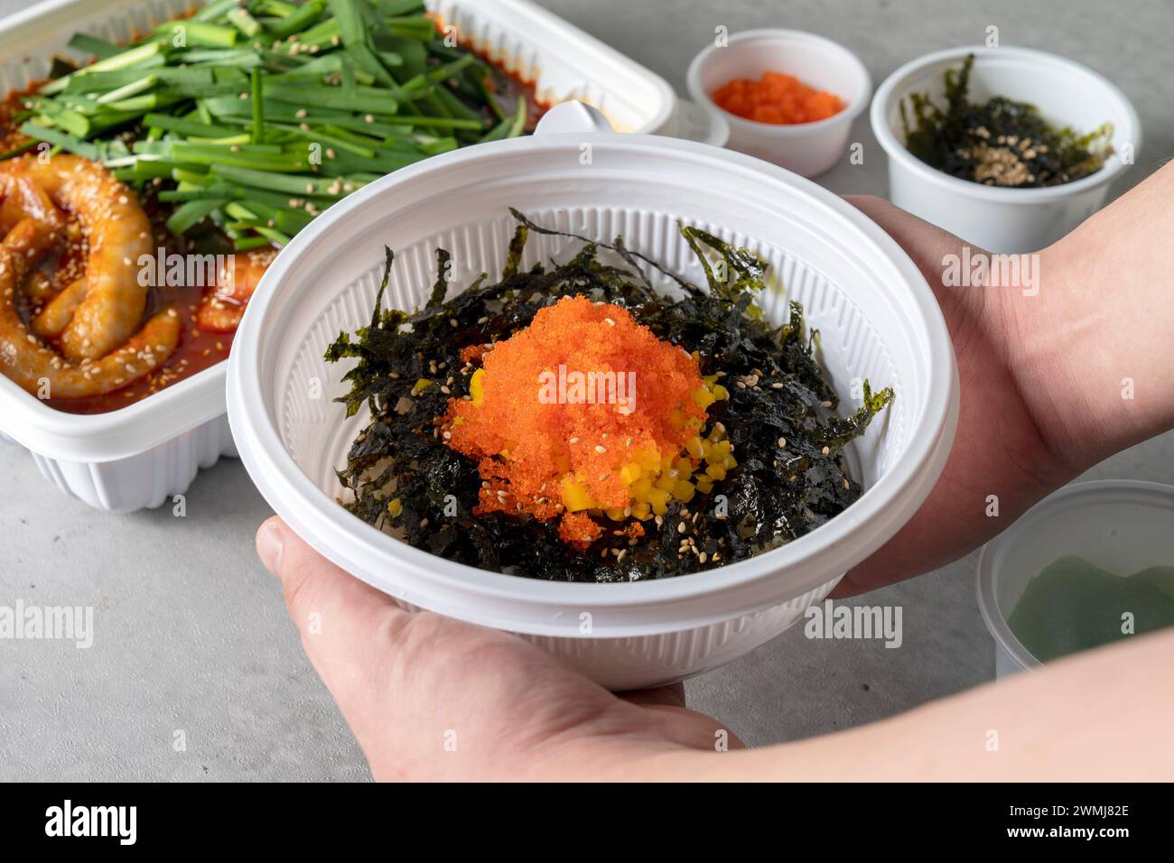 Beef gopchang gopdoritang, flying fish roe rice balls, and gopchang ...